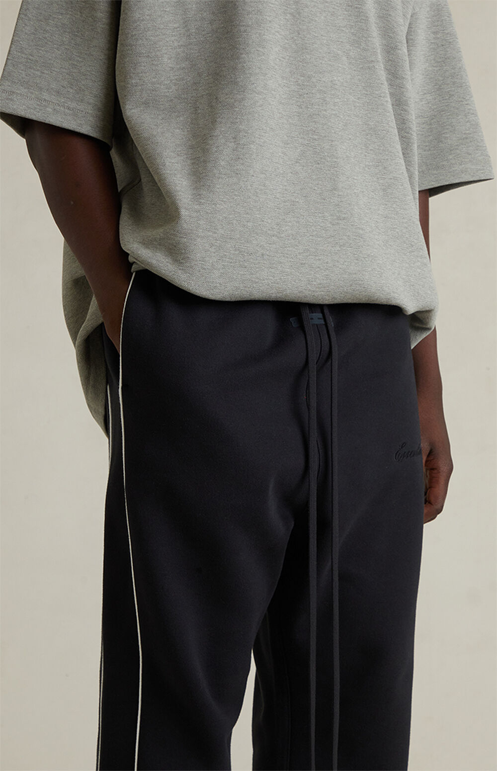 Fear of God ESSENTIALS Jet Black & Cloud White Relaxed Fleece ...