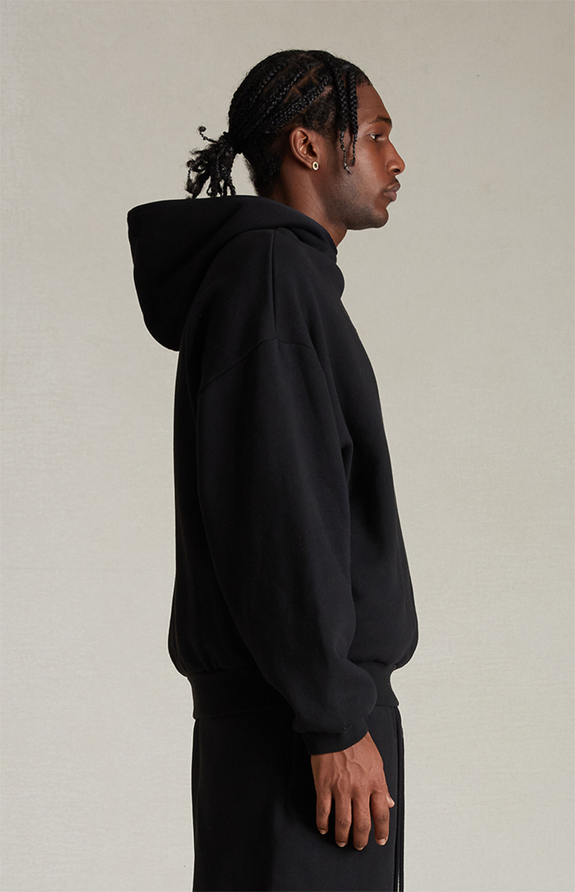 Fear of God Essentials Jet Black Hoodie | PacSun