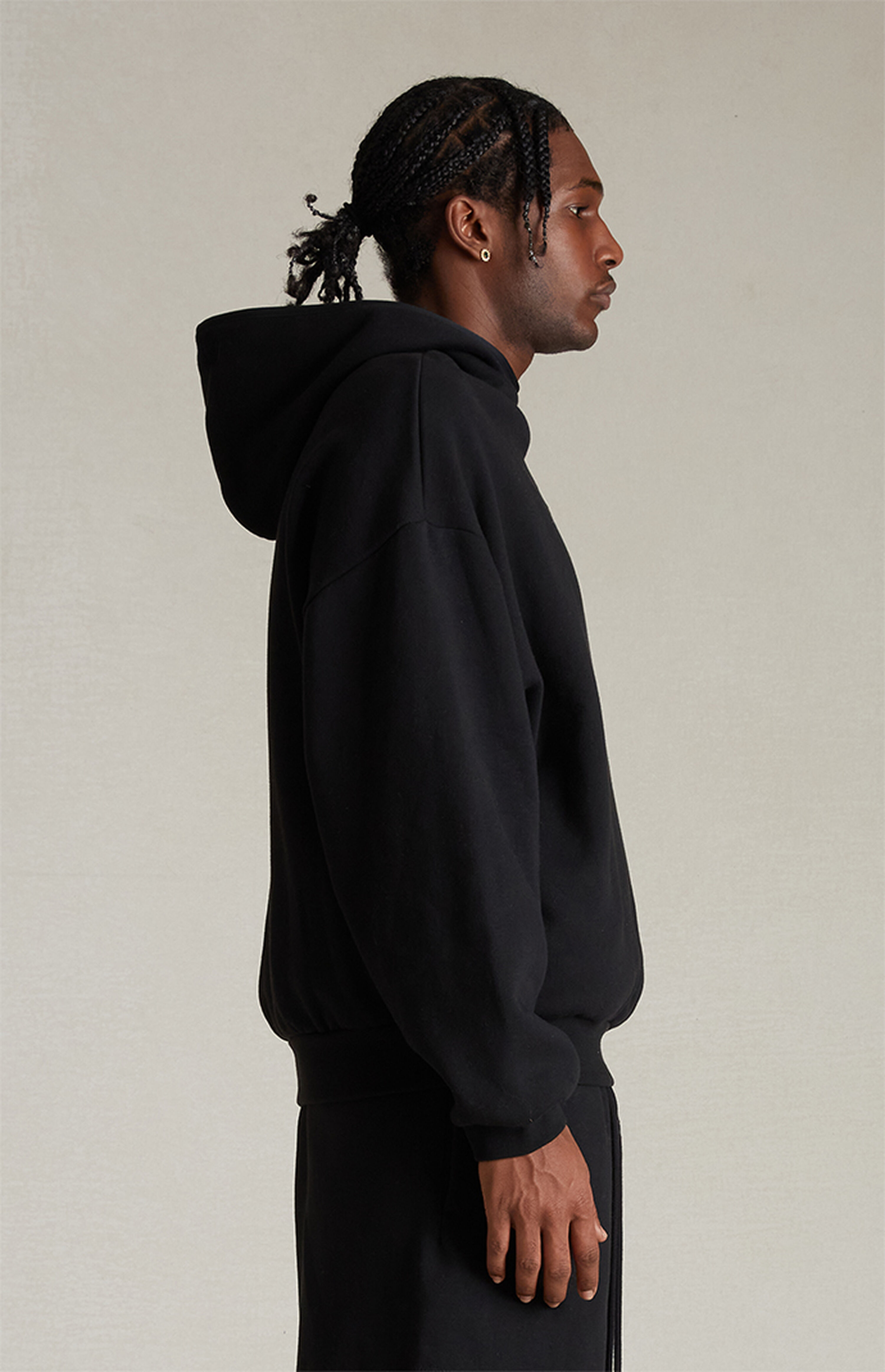 Fear of God ESSENTIALS Jet Black Hoodie | PacSun