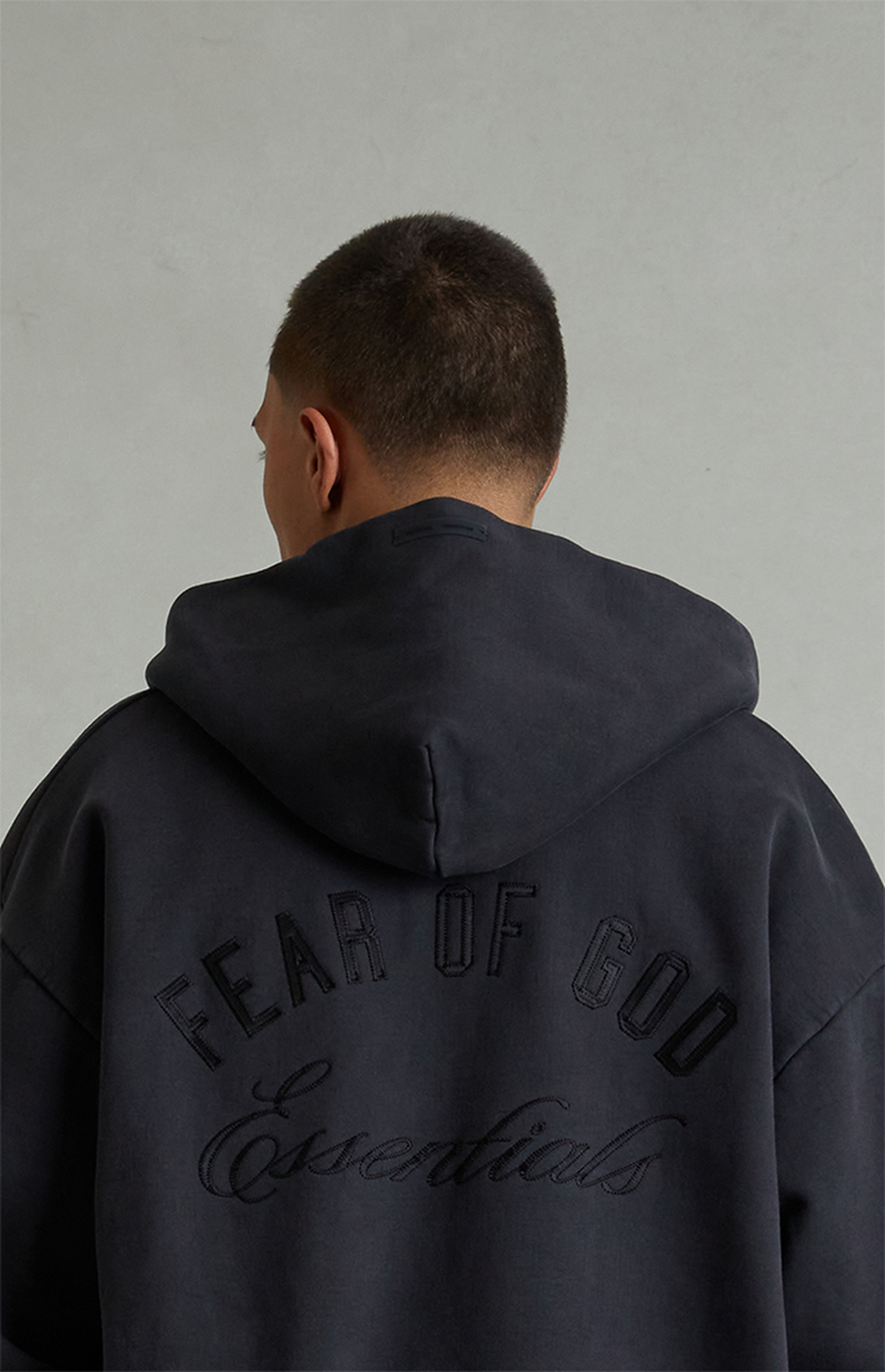 Fear of God ESSENTIALS Vintage Black Classic Full Zip Hoodie | Pacsun
