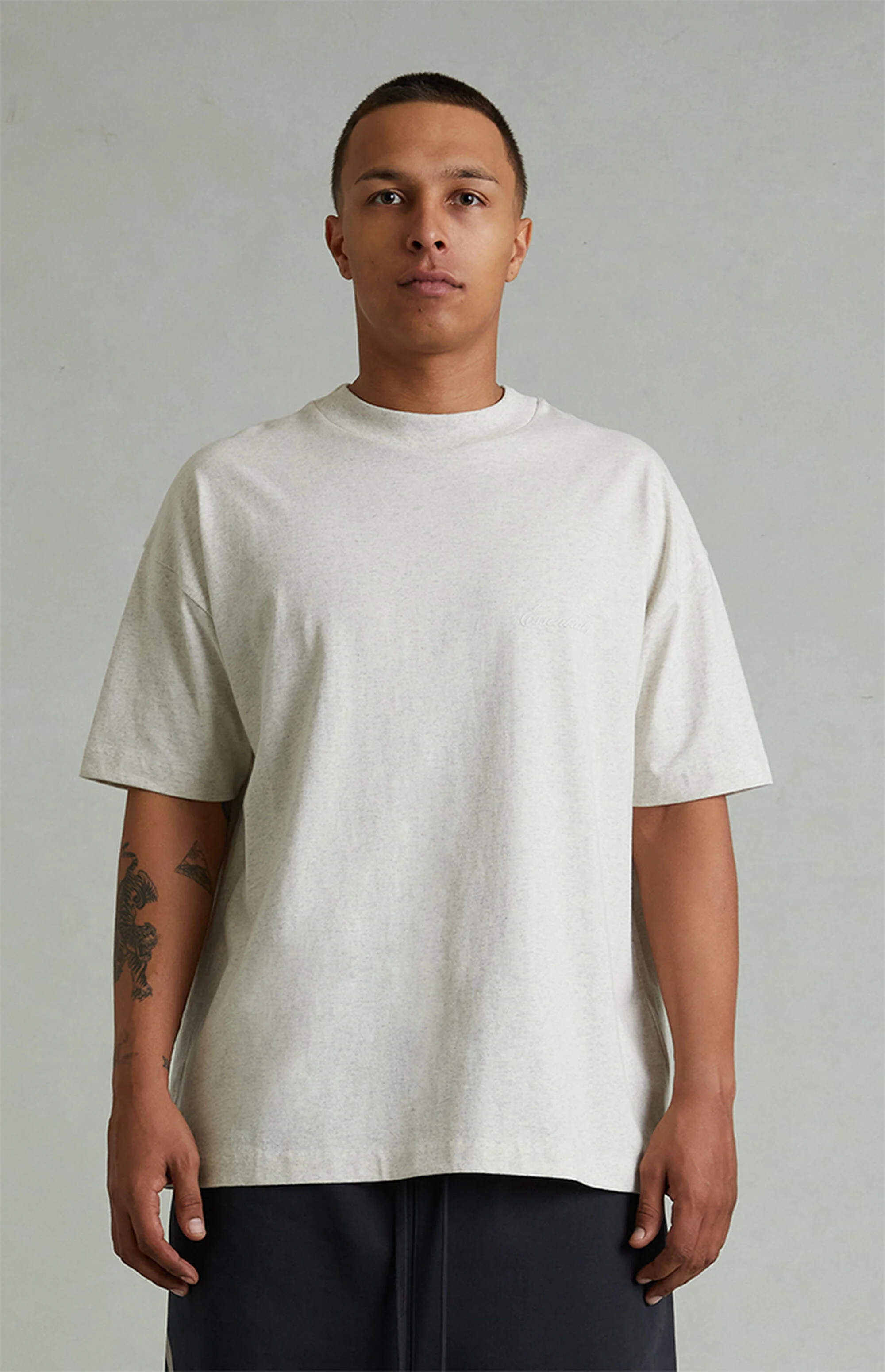 Fear of God ESSENTIALS Heather Oatmeal Classic Short Sleeve T-Shirt ...