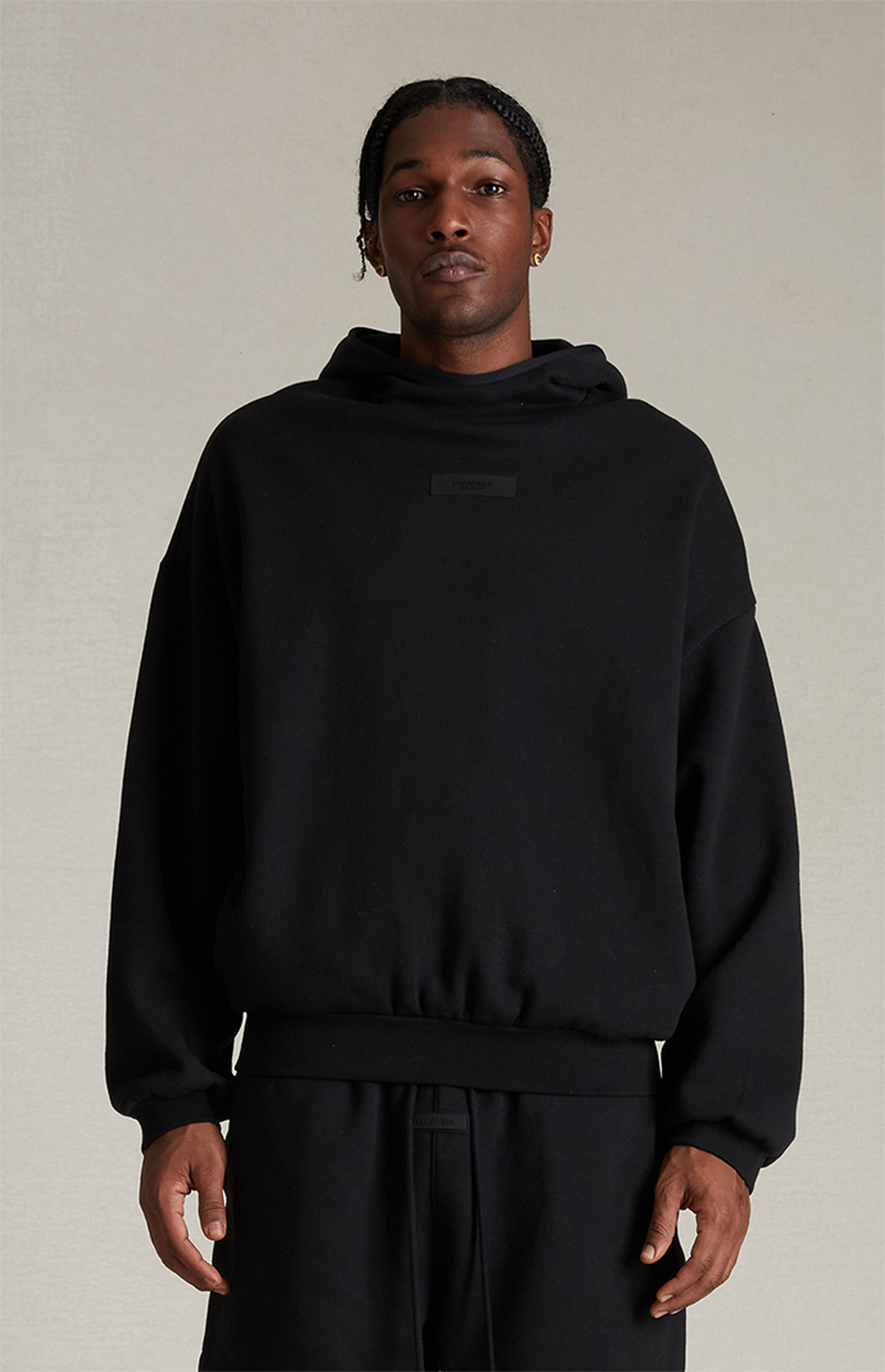Fear of God ESSENTIALS Jet Black Hoodie | PacSun
