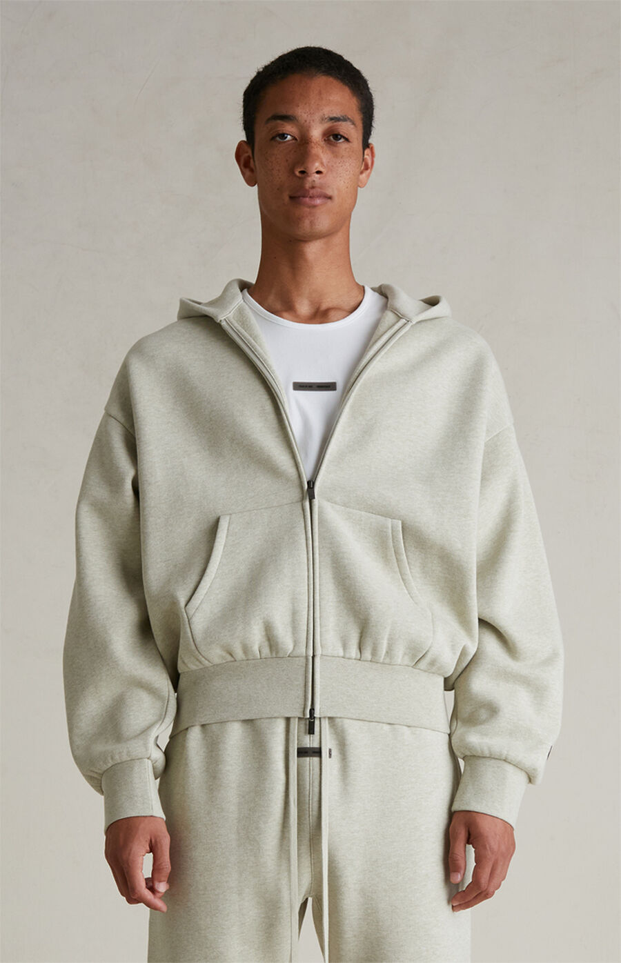 Fear of God ESSENTIALS Heather Stone Classic Fleece Zip Up Hoodie | Pacsun