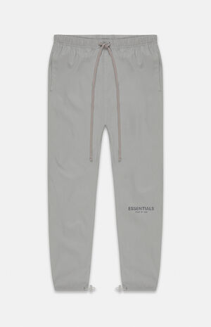 Fear of God Essentials Essentials Silver Reflective Nylon Track Pants ...