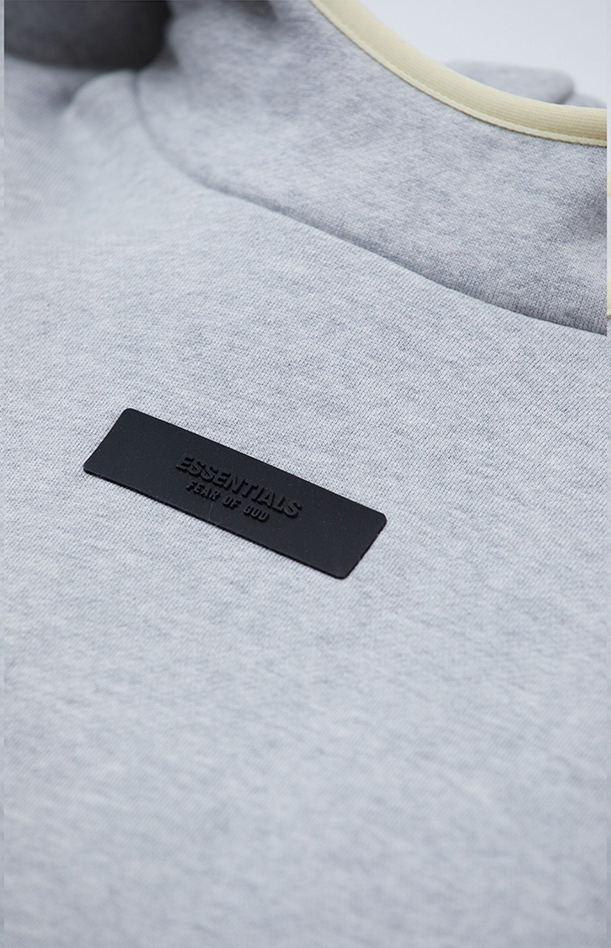 Fear of God ESSENTIALS Light Heather Grey Hoodie | PacSun