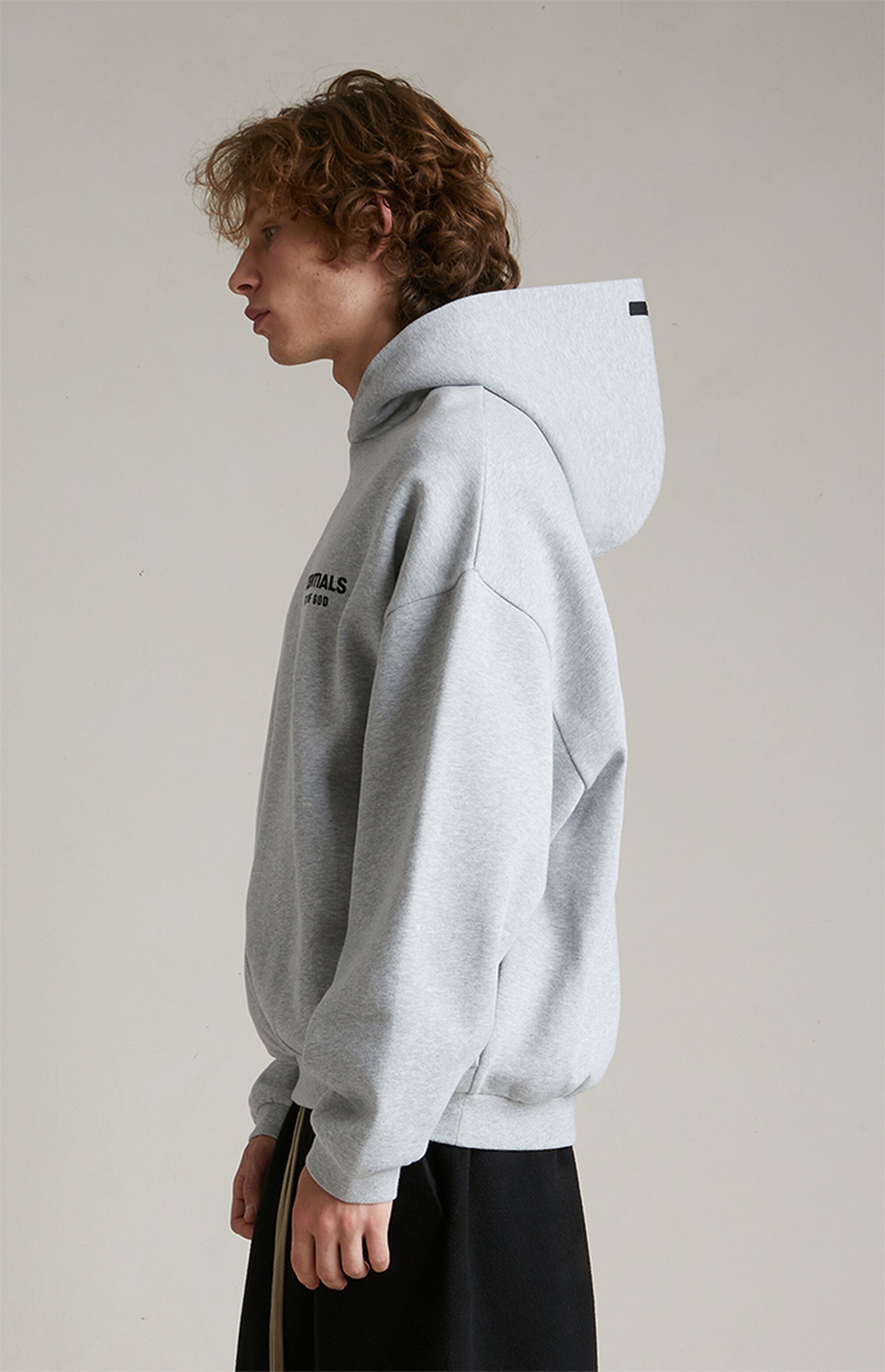 Fear of God ESSENTIALS Light Heather Grey Fleece Hoodie | PacSun