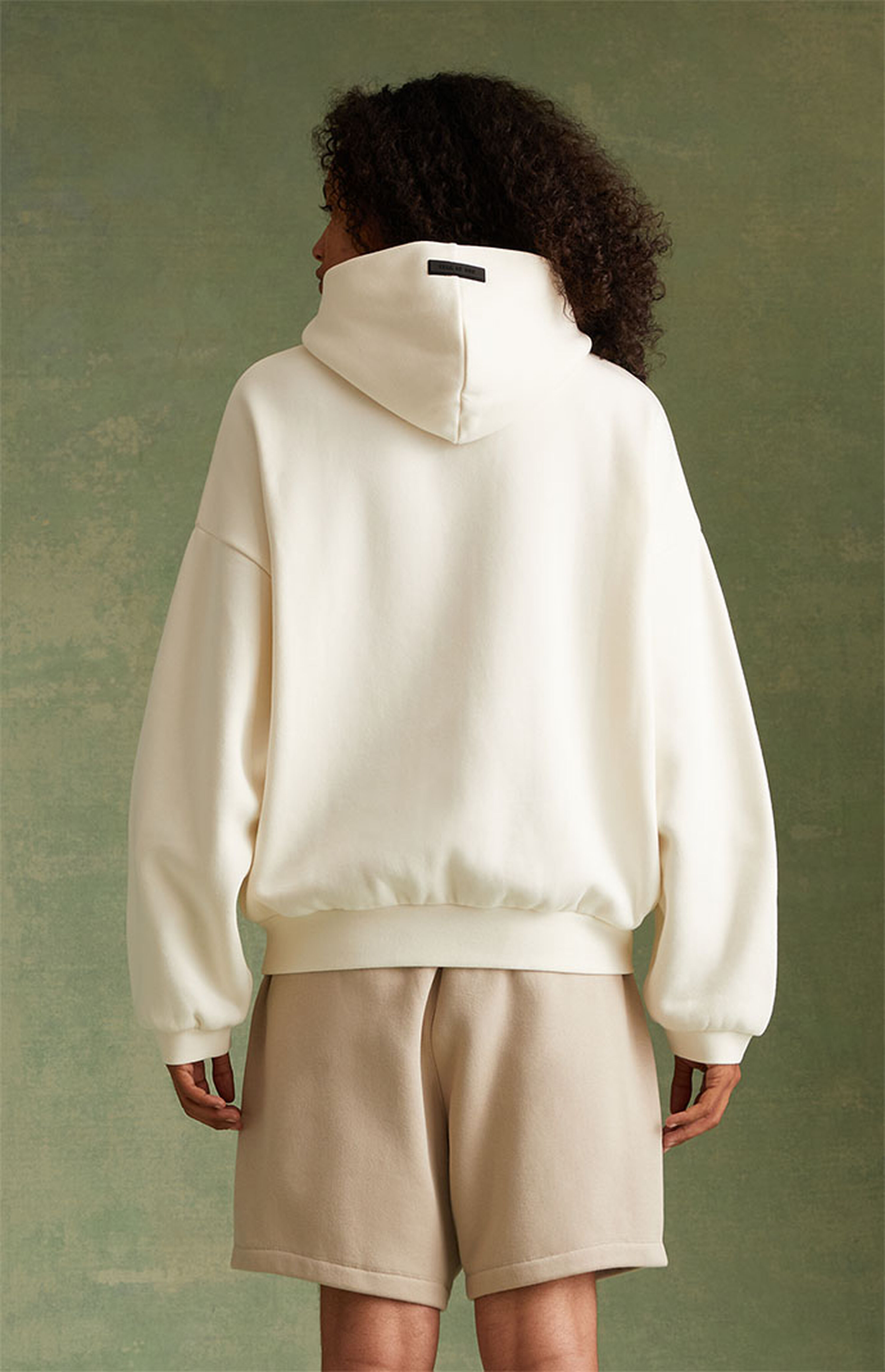 Fear of God ESSENTIALS Cloud Dancer Hoodie | PacSun