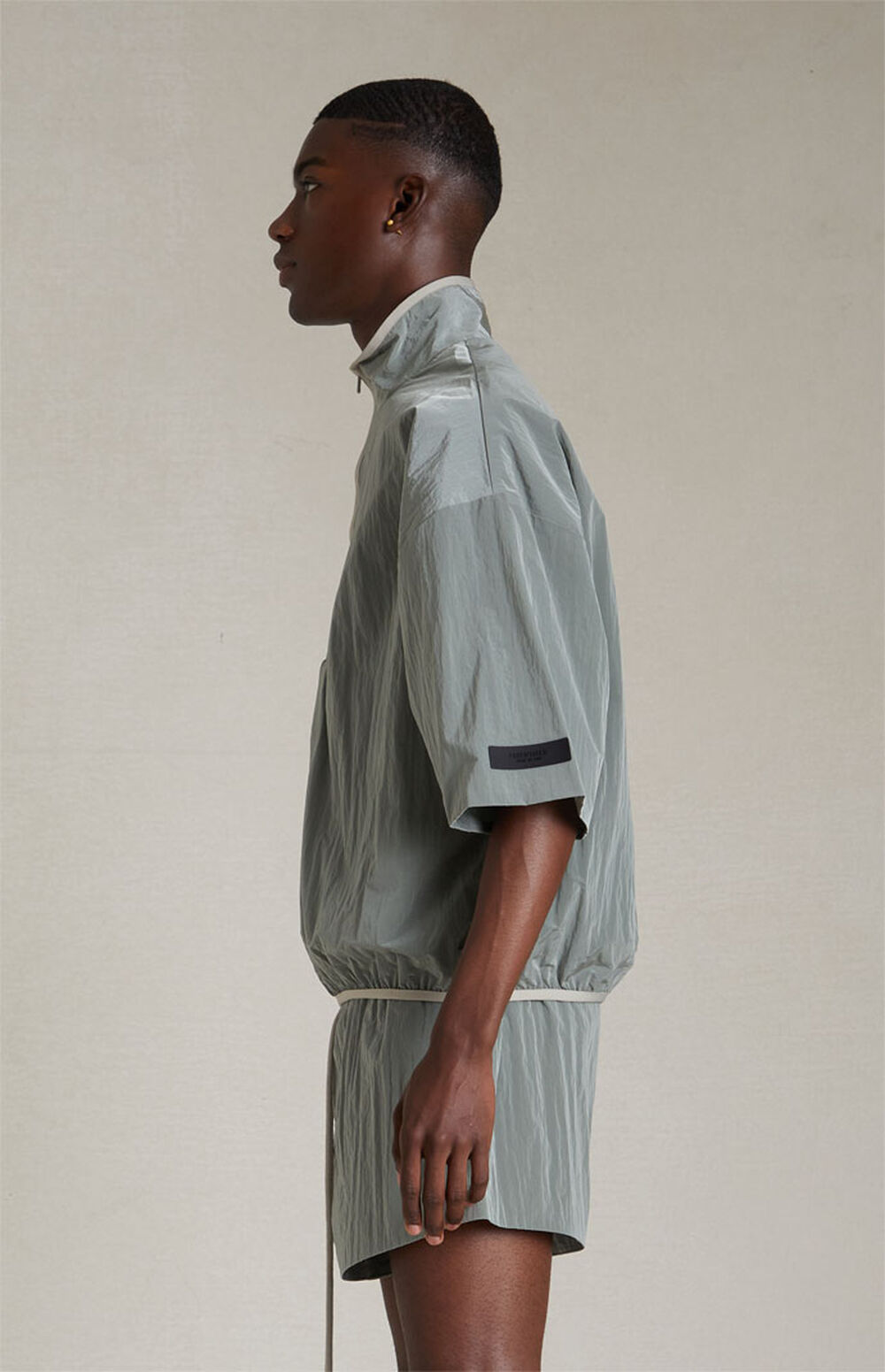 Fear of God Essentials Seal Crinkle Nylon Half Zip Mock Neck Shirt | Pacsun