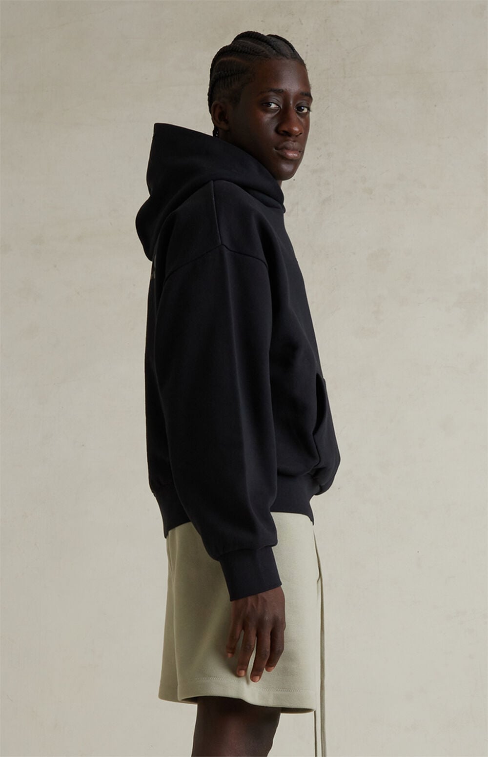 Fear of God ESSENTIALS Jet Black Classic Fleece Hoodie | Pacsun