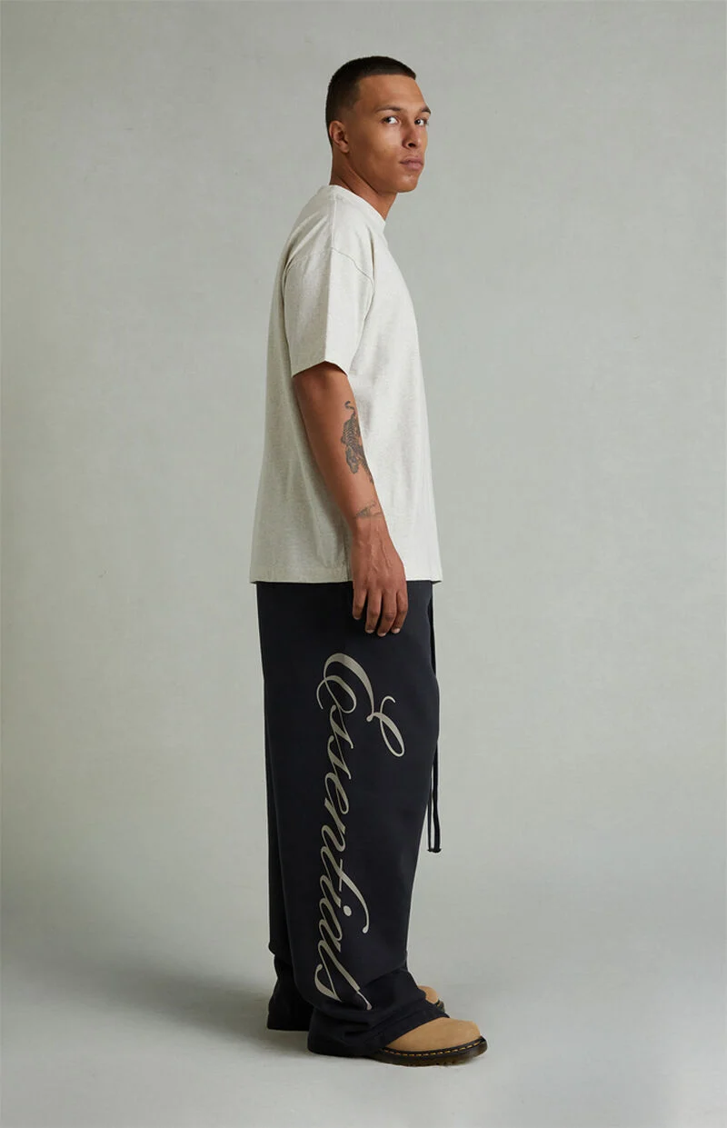 Fear of God ESSENTIALS Vintage Black Script Logo Lounge Fleece Baggy ...