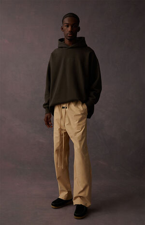 Fear of God Essentials Off Black Relaxed Hoodie | PacSun