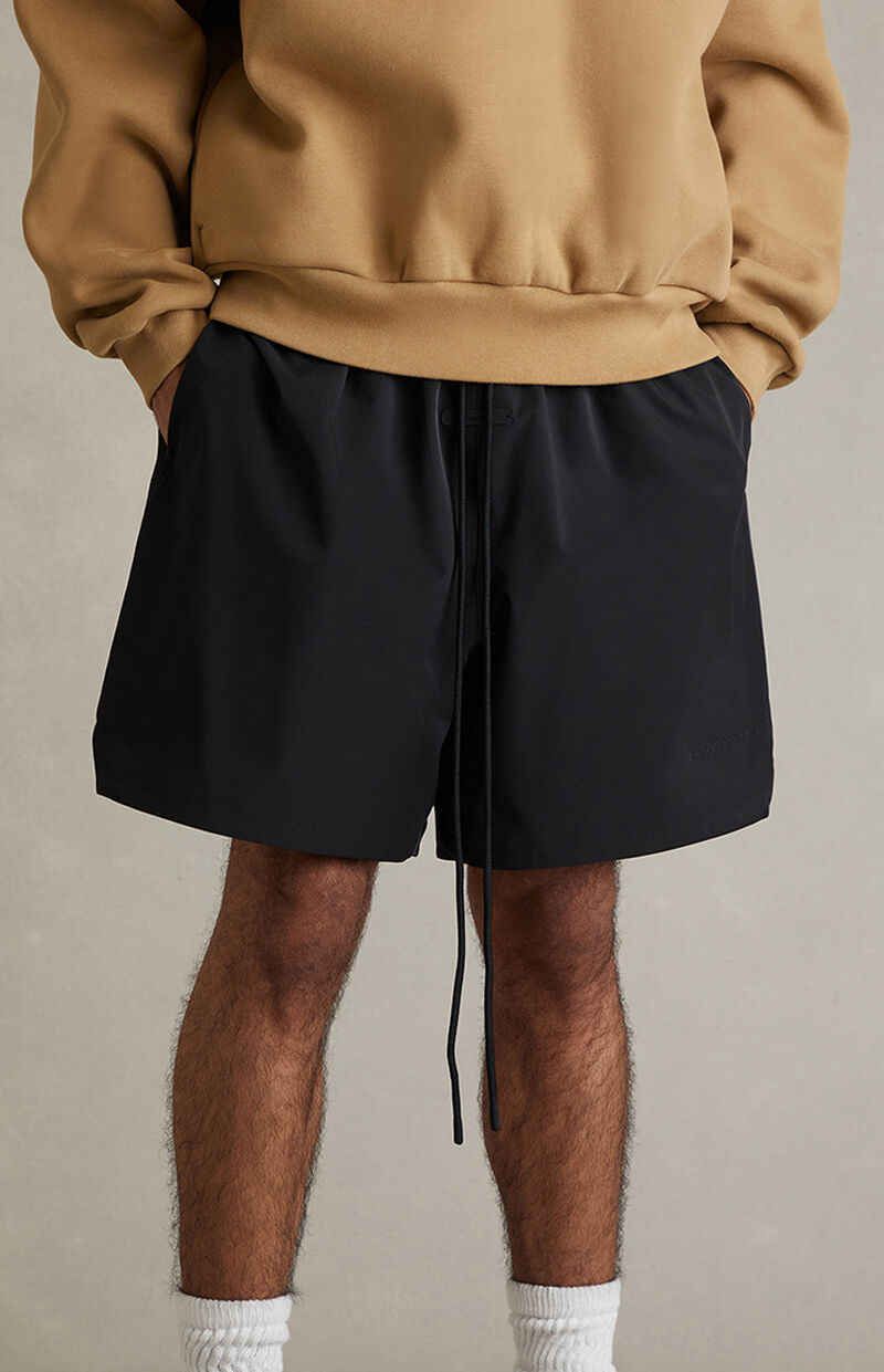 Fear of God ESSENTIALS Vintage Black Active Trace Classic Shorts | Pacsun