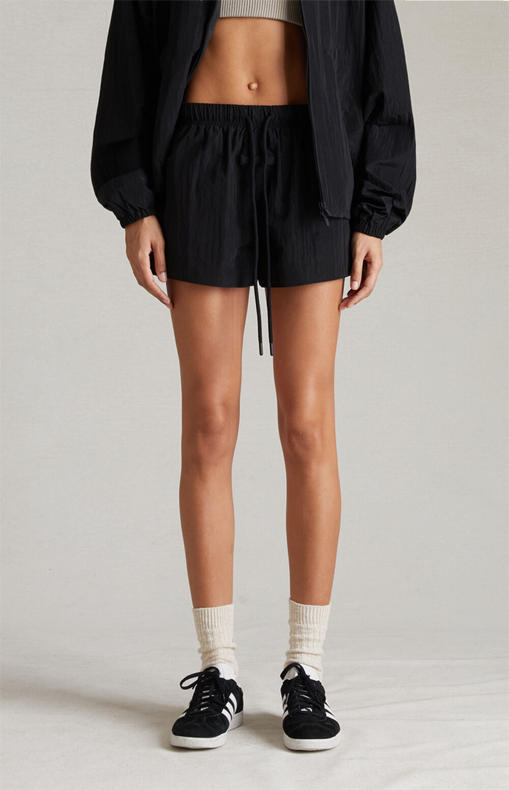 Fear of God Essentials Women's Jet Black Crinkle Nylon Running Shorts ...