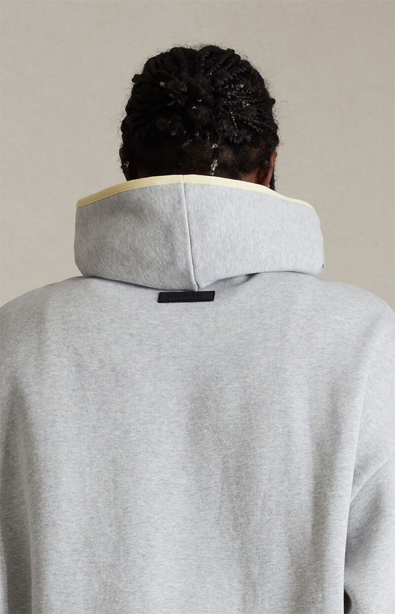 Fear of God ESSENTIALS Light Heather Grey Hoodie | PacSun