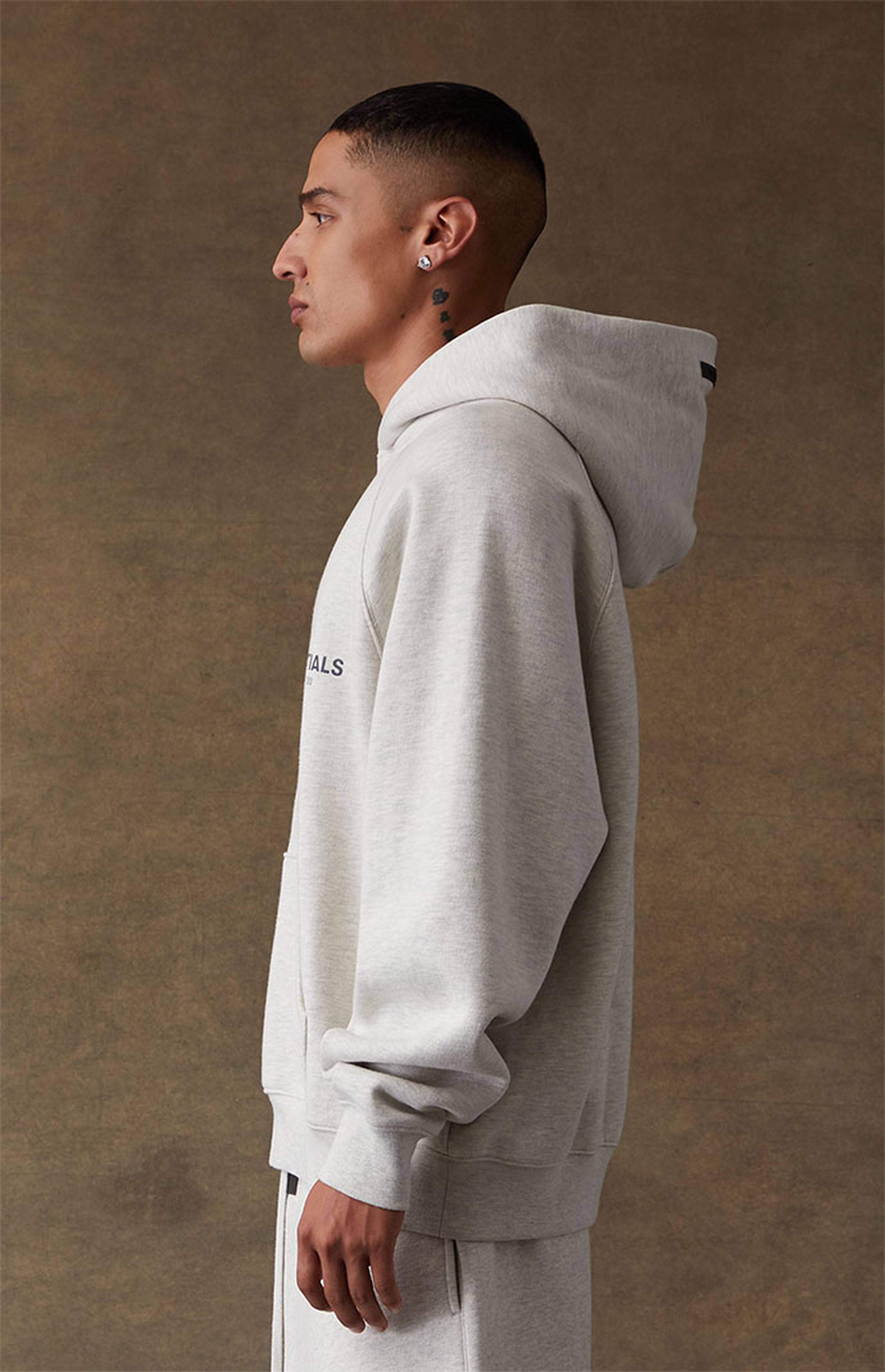 Fear of God Essentials Light Oatmeal Hoodie | PacSun