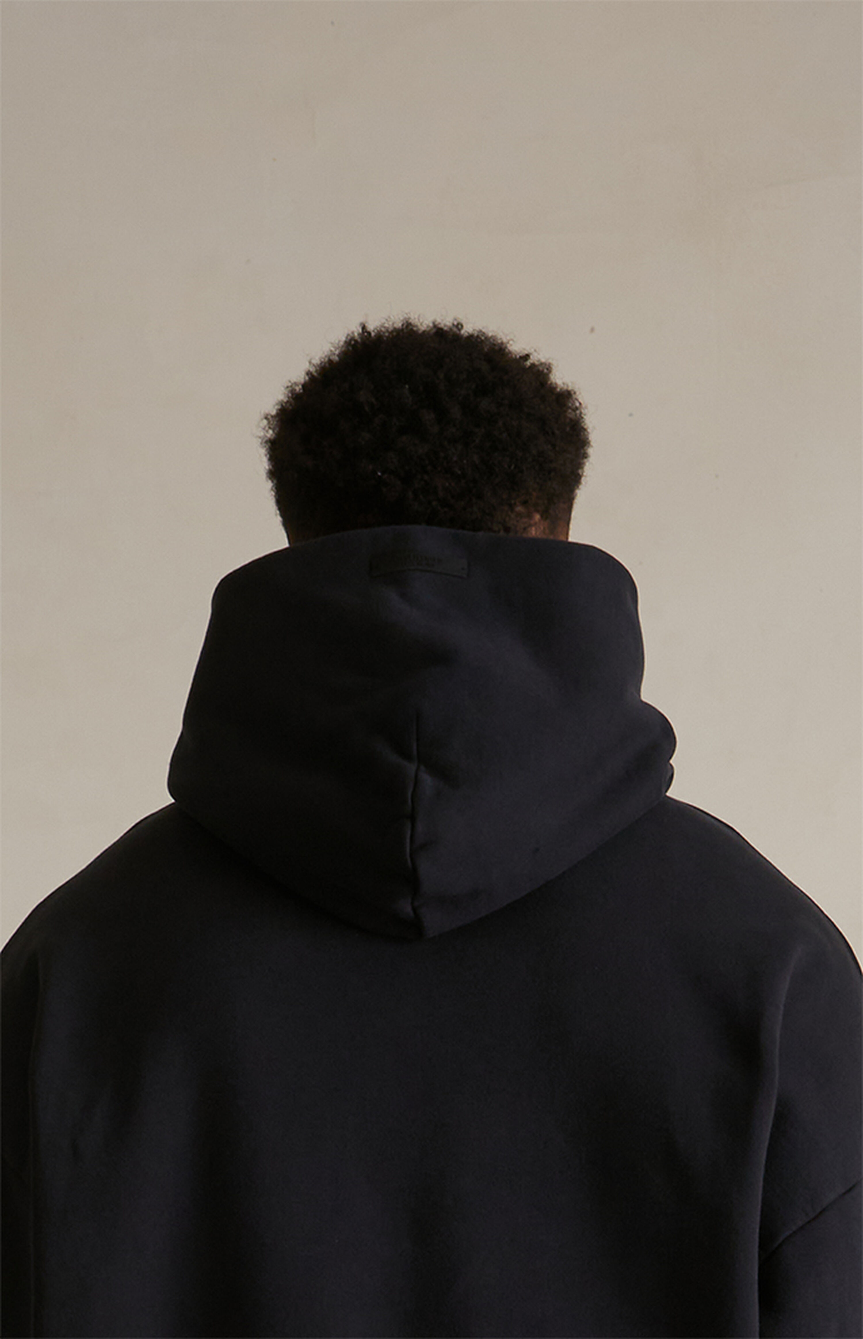 Fear of God ESSENTIALS Black Heavy Fleece Hoodie | Pacsun