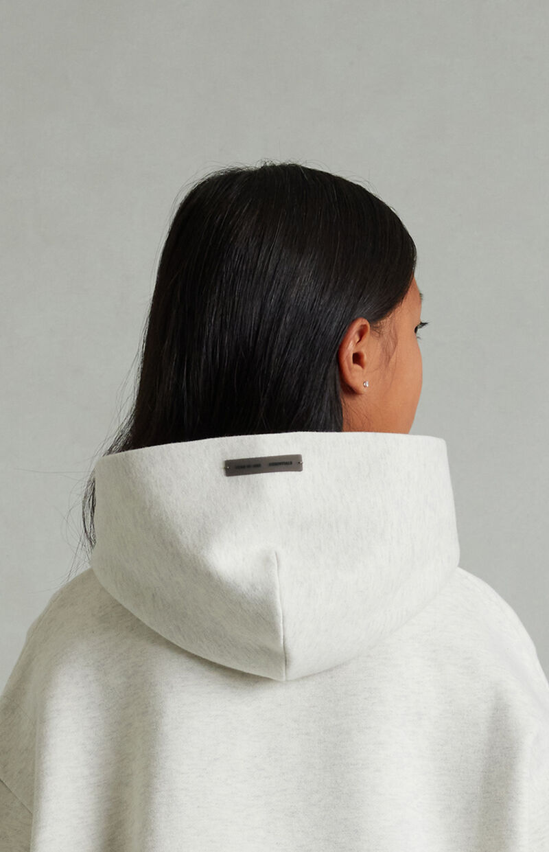 Fear of God ESSENTIALS Kids Heather Oatmeal Embossed Classic Hoodie ...