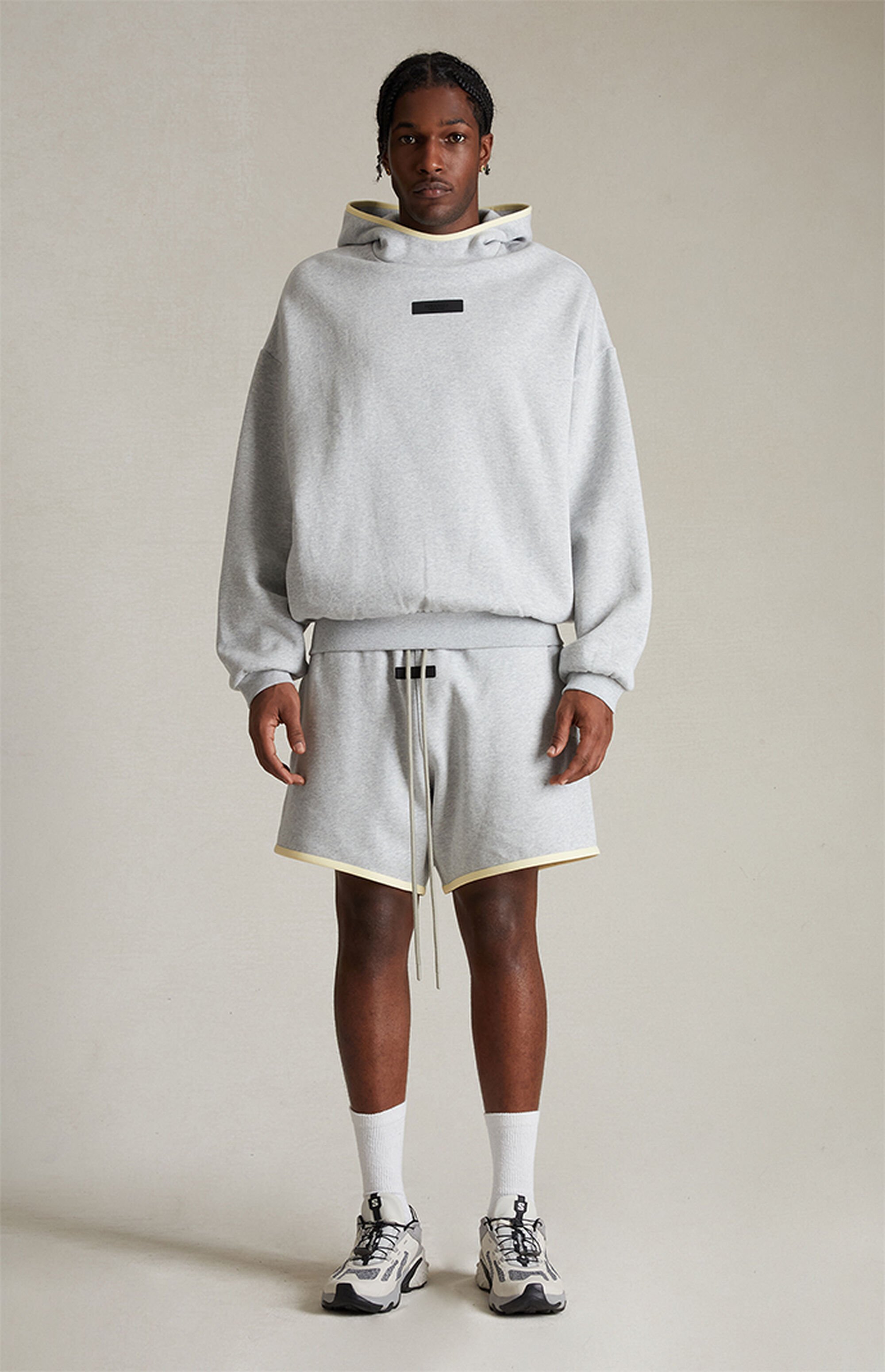 Fear of God ESSENTIALS Light Heather Grey Hoodie | PacSun