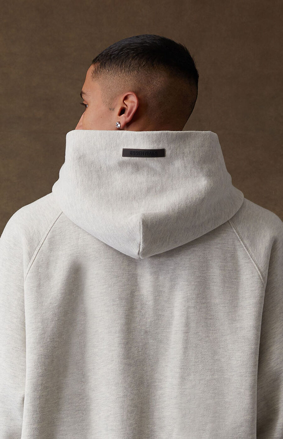 Fear of God Essentials Light Oatmeal Hoodie | PacSun