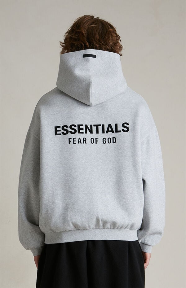 Fear of God ESSENTIALS Light Heather Grey Fleece Hoodie | PacSun