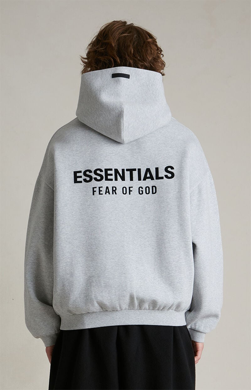 Fear of God ESSENTIALS Light Heather Grey Fleece Hoodie | PacSun
