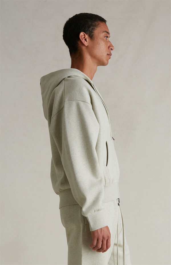 Fear of God ESSENTIALS Heather Stone Classic Fleece Zip Up Hoodie | Pacsun
