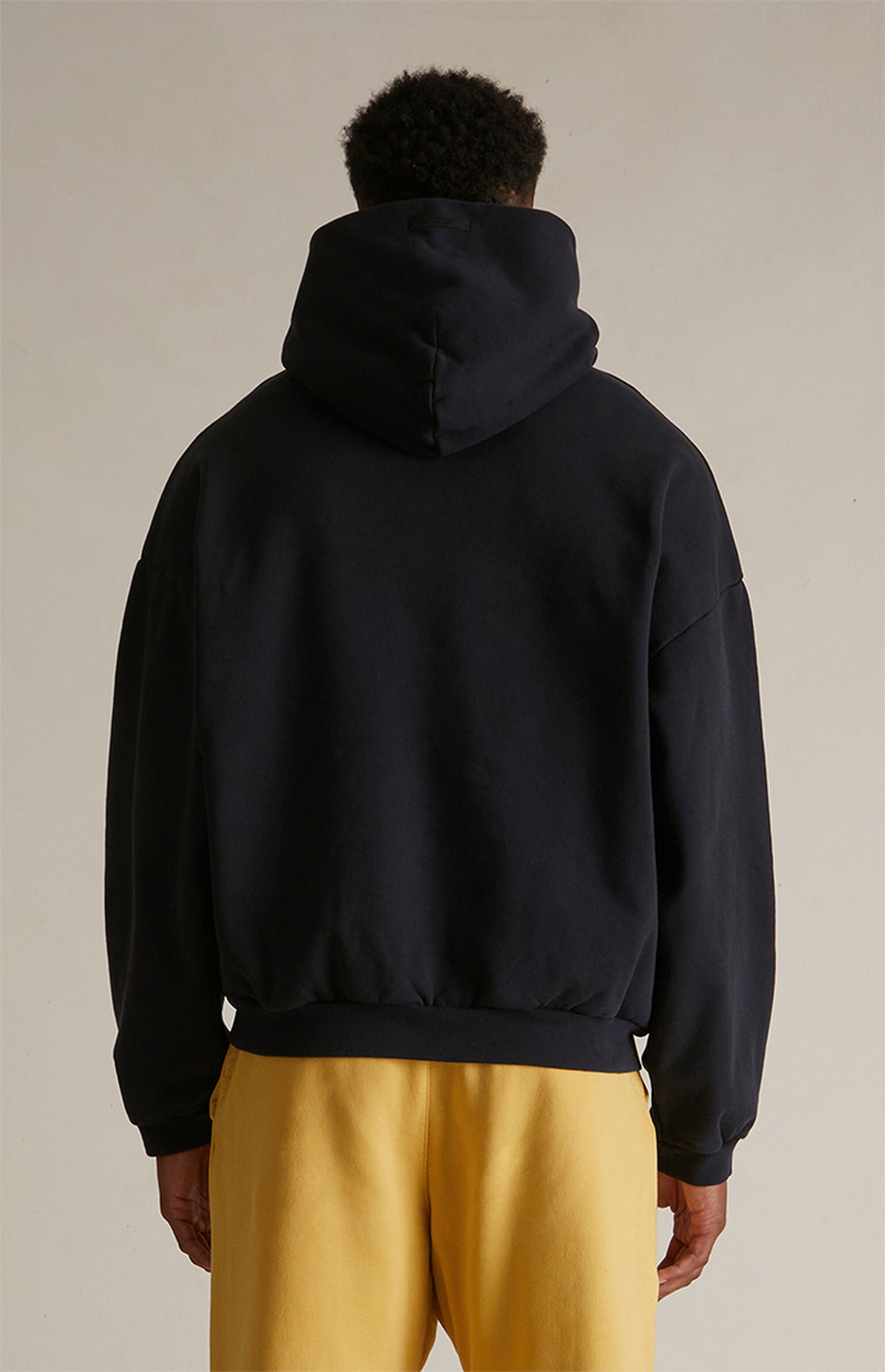 Fear of God ESSENTIALS Black Heavy Fleece Hoodie | Pacsun