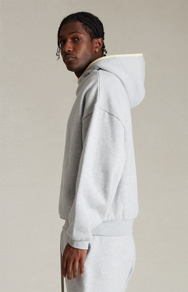 Fear of God Essentials Light Heather Grey Hoodie | PacSun