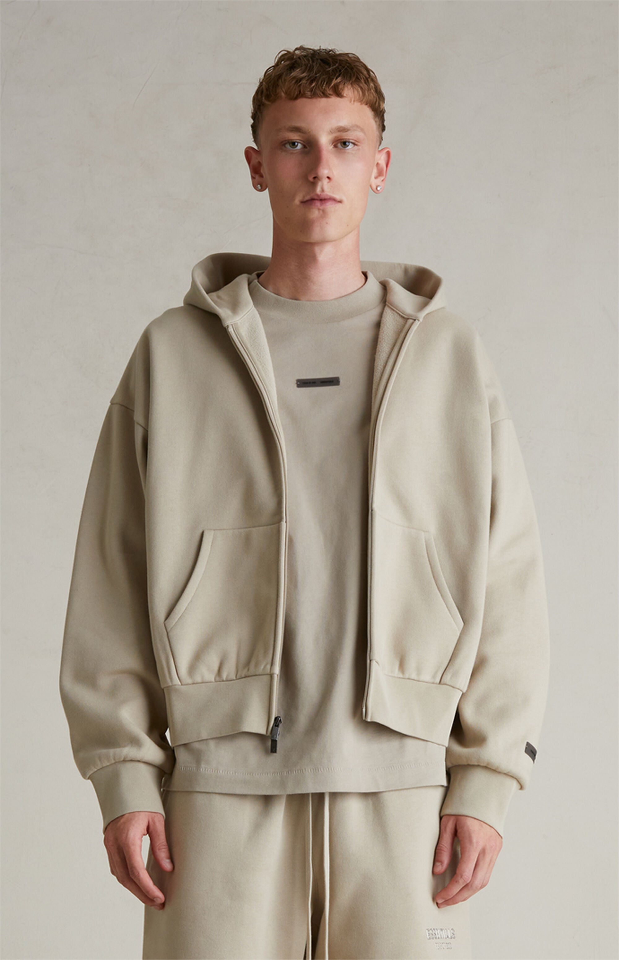 Fear of God ESSENTIALS Timber Classic Fleece Zip Up Hoodie | Pacsun