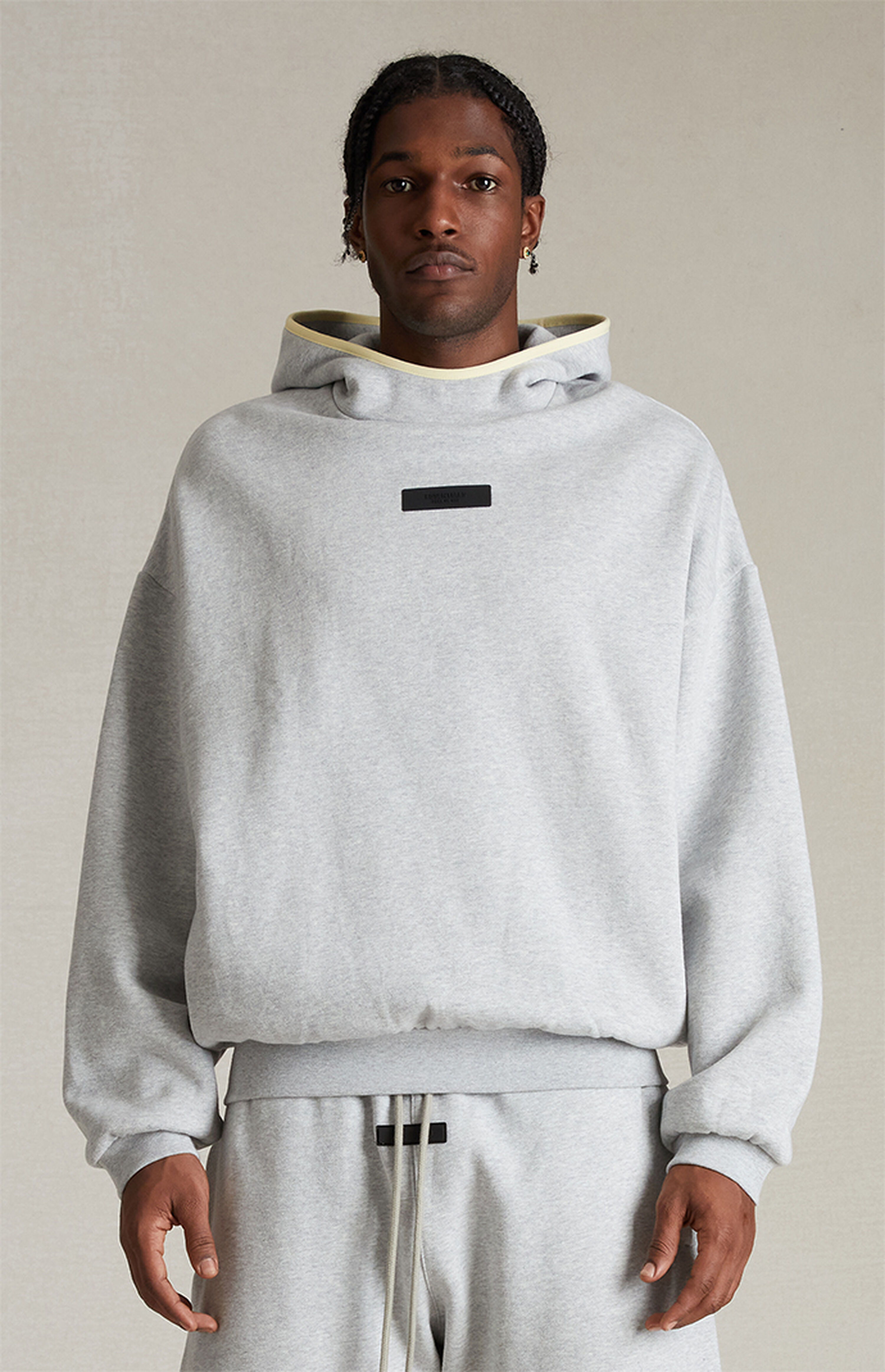 Fear of God ESSENTIALS Light Heather Grey Hoodie | PacSun