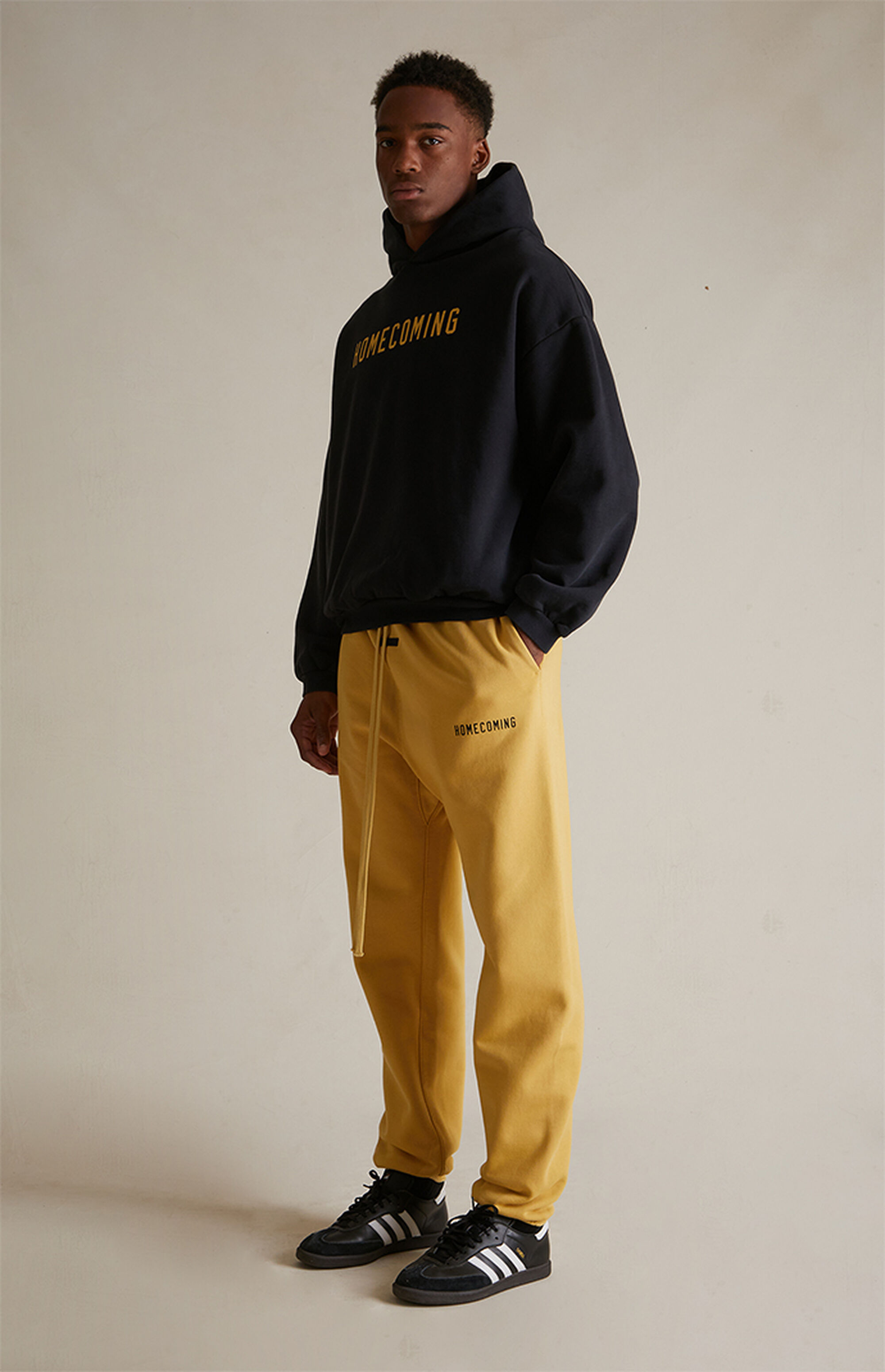 Fear of God ESSENTIALS Black Heavy Fleece Hoodie | Pacsun