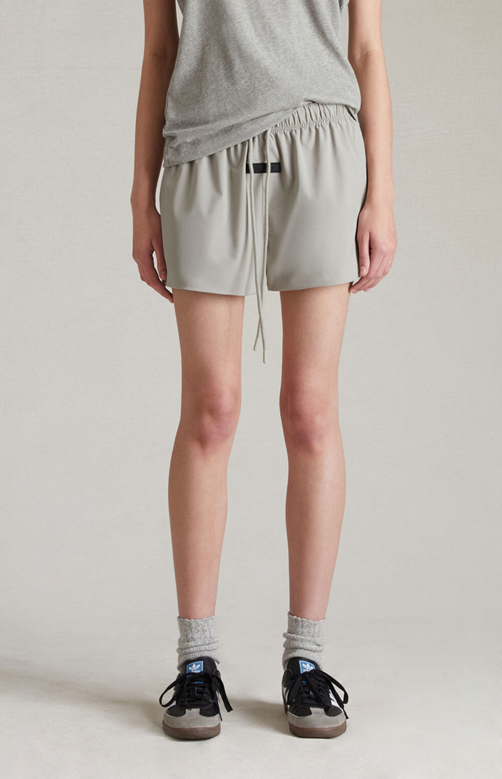 Fear of God Essentials Women's Seal Nylon Running Shorts | PacSun