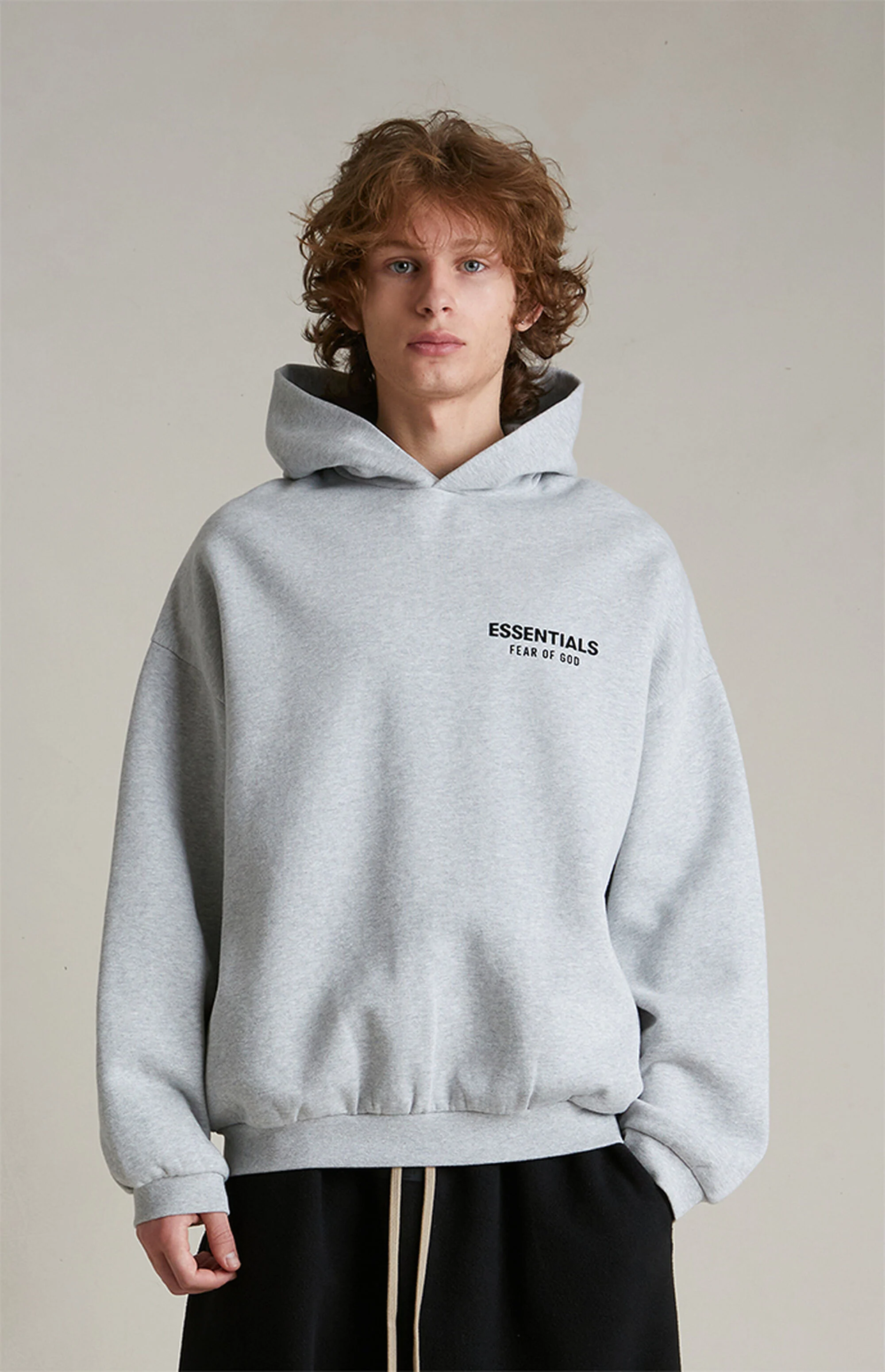 Fear of God ESSENTIALS Light Heather Grey Fleece Hoodie | Pacsun