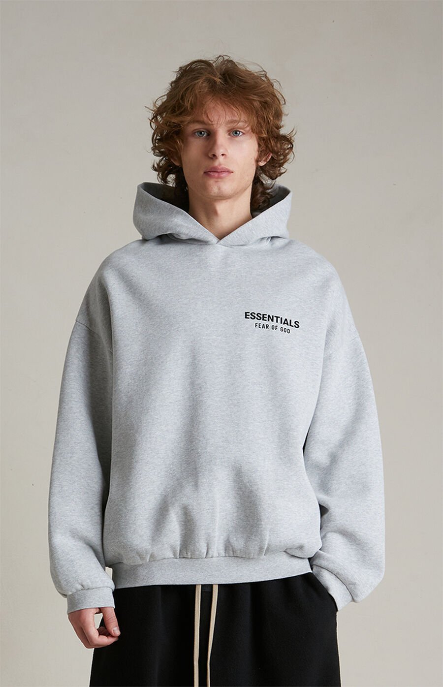 Fear of God ESSENTIALS Light Heather Grey Fleece Hoodie | PacSun