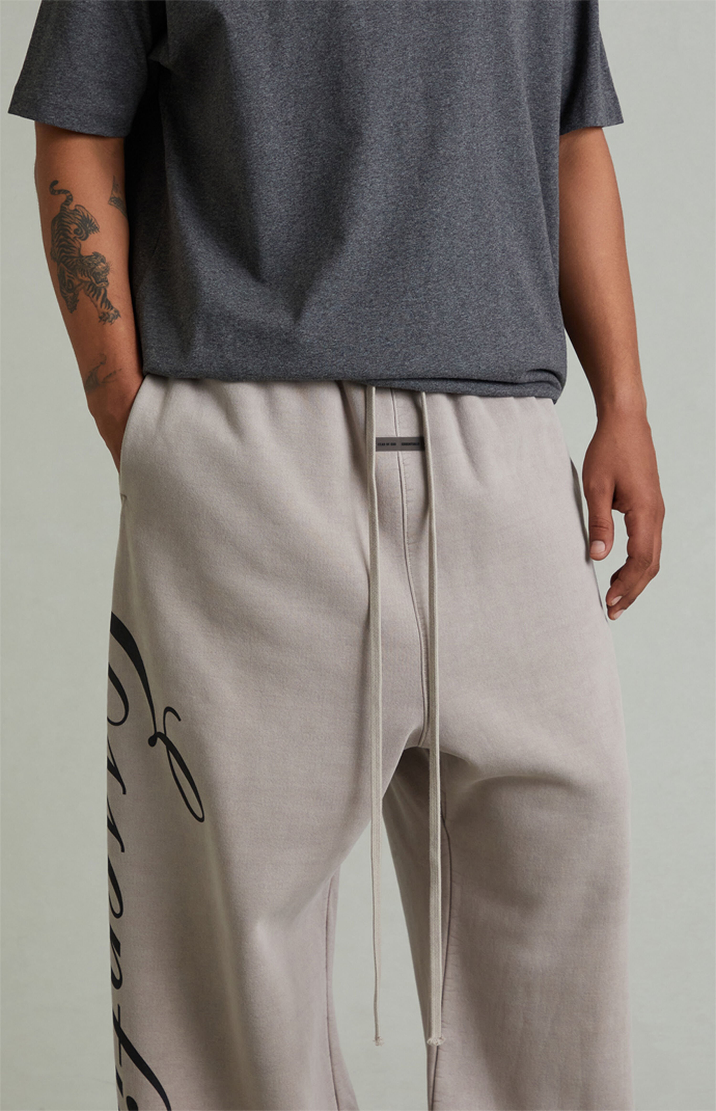 Fear of God ESSENTIALS Smoke Grey Script Logo Lounge Fleece Baggy ...