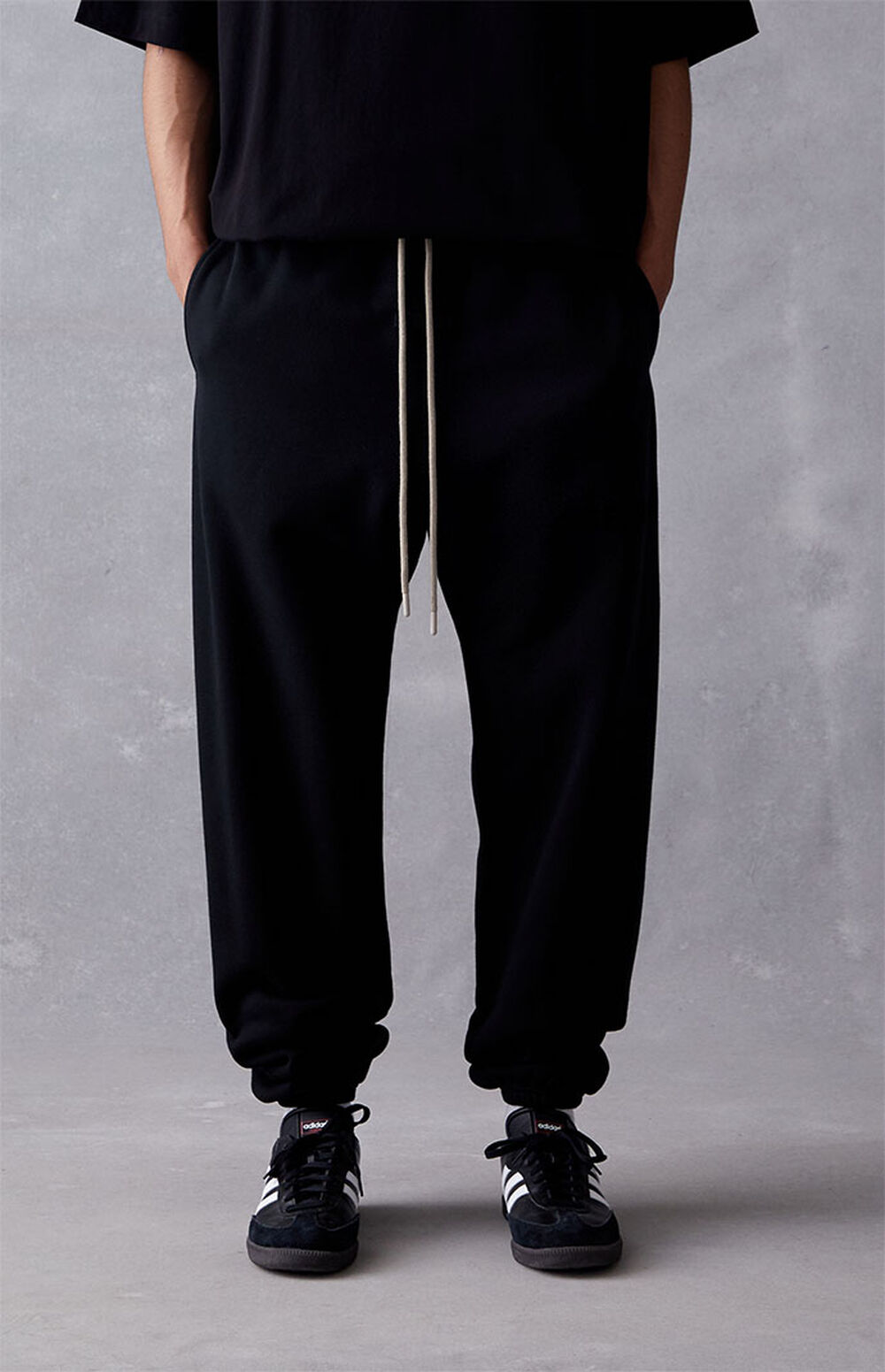 Fear of God Essentials Jet Black Sweatpants | Pacsun