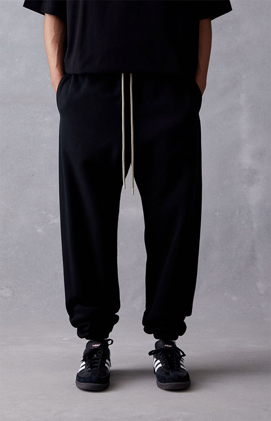 Fear of God Essentials Jet Black Sweatpants | PacSun