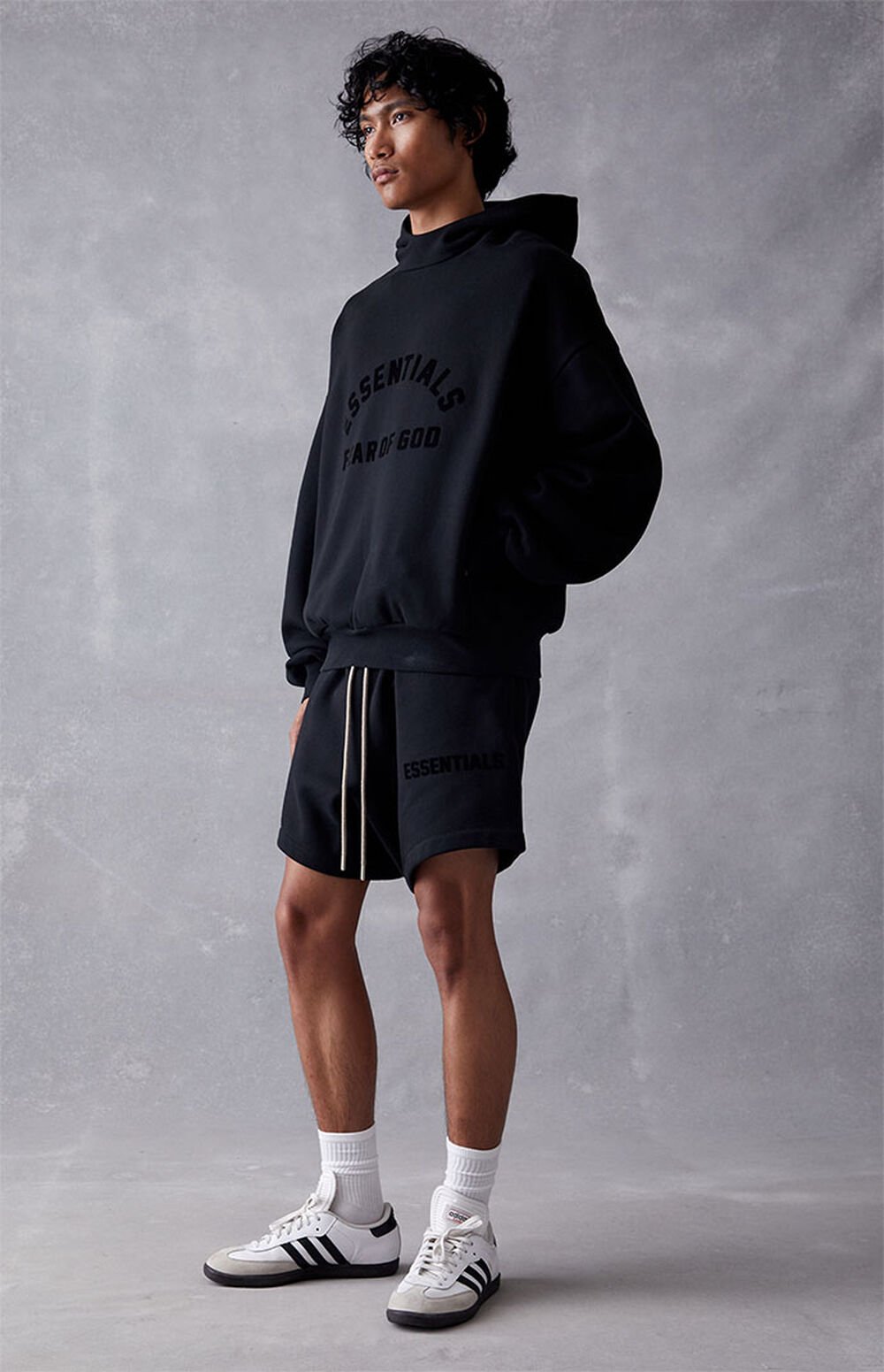 Fear of God ESSENTIALS Jet Black Hoodie | PacSun