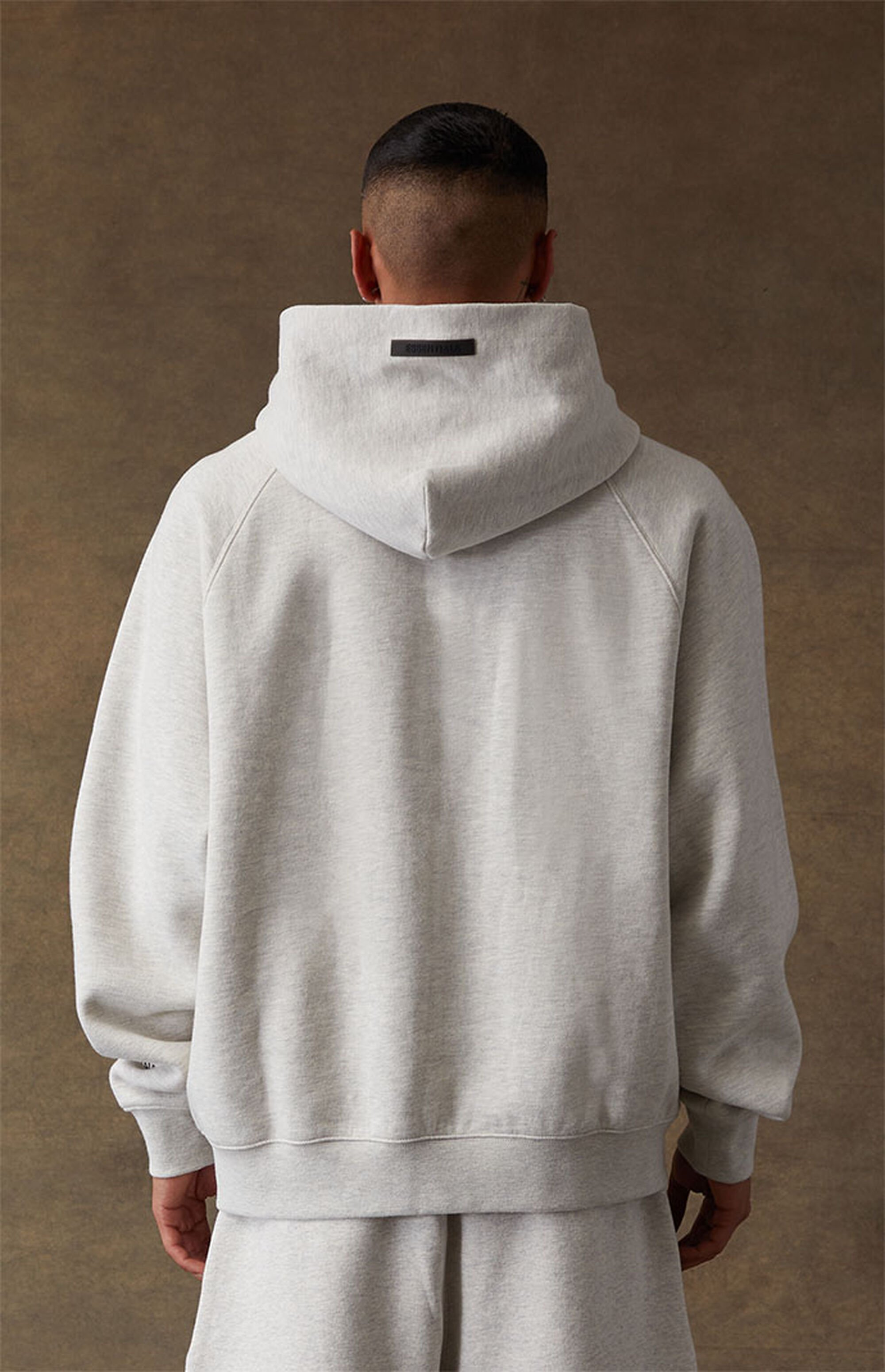 Fear of God Essentials Light Oatmeal Hoodie | PacSun