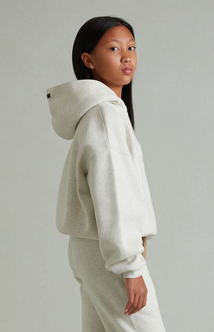 Fear of God ESSENTIALS Kids Heather Oatmeal Embossed Classic Hoodie ...
