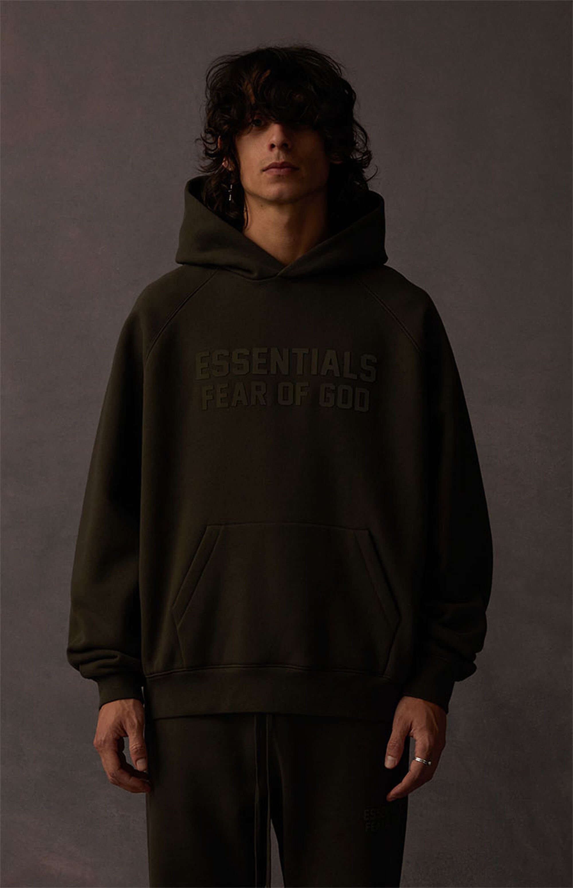 Fear of God ESSENTIALS Off Black Hoodie | PacSun